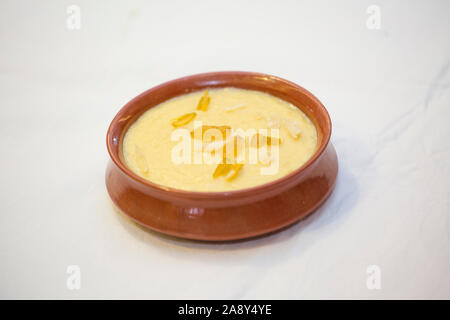 Nawabi food - Bowl of ferni created by milk and best quality rice Stock ...