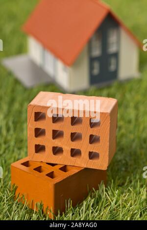 a small brick house in miniature of a small brick Stock Photo - Alamy