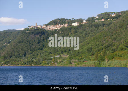 The town of Nemi on the Alban Hills, overlooking Lake Nemi, near Rome ...