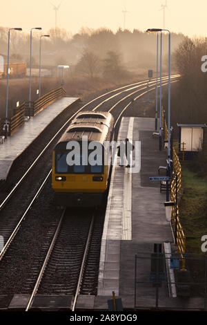 Passengers boarding Arriva Northern rail class 150 sprinter train ...