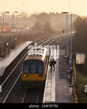Passenger boarding a Arriva Northern rail class 142 pacer train at ...