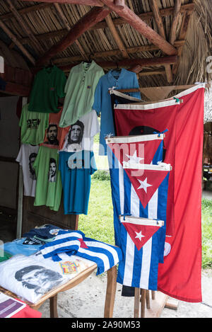 Cuba, Vinales, Cuban flag in courtyard and wrought iron gate Stock ...