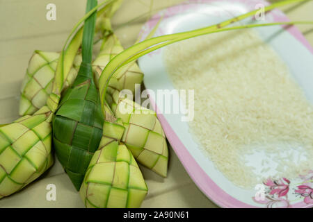 Woven pouches of coconut leaves known as Puso in the Visayas area of ...