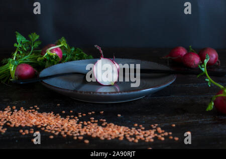 Radish on a plate. The concept of healthy eating Stock Photo - Alamy