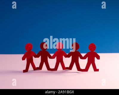 Row of paper people holding hands. Crowd illustration Stock Photo - Alamy