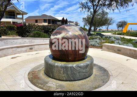 rotating spherical sculpture art Midalia's beach Geraldton Stock Photo ...
