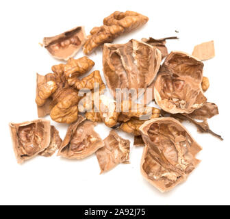 Crushed walnut isolated on white background Stock Photo - Alamy