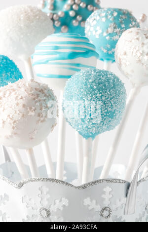 Teal and white cake pops Stock Photo - Alamy