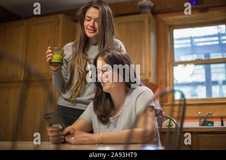 Woman with Multiple Sclerosis talking to her daughter about a text ...