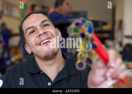 Boy with Spastic Quadriplegic Cerebral Palsy using using his special ...