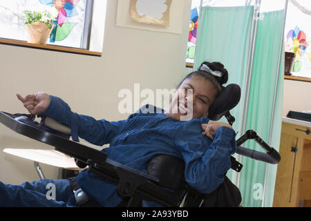 Teen with Spastic Dystonic Cerebral Palsy at school Stock Photo - Alamy