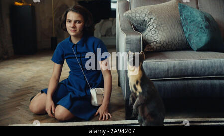 London.UK. Dafne Keen and Pantalaimon (voiced by Kit Connor) in a scene ...