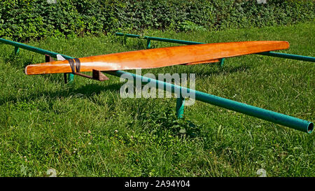 Wooden boat upside down in yard Stock Photo - Alamy