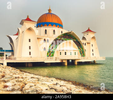 The Melaka Straits Mosque at sunset on the artificial Malacca Island ...
