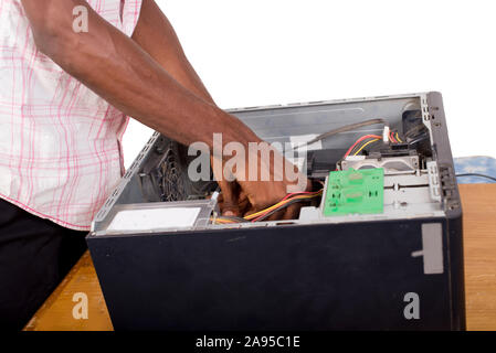 interior of an open computer being repaired by a man Stock Photo - Alamy