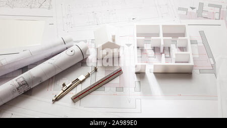 House model and blueprint plans, residential building project ...