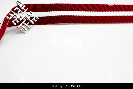 Ribbon in Latvian flag colors and Latvian traditional thunder cross ...