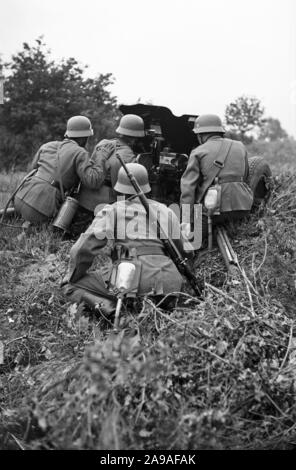 Soldiers of the German Wehrmacht practising and exercising on a ...