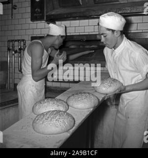 A bakerman and his daily business, Germany 1950s Stock Photo - Alamy
