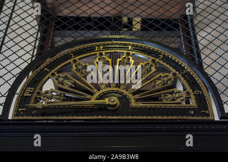 A vintage elevator floor level indicator at basement level - USA Stock ...