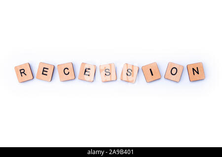 The word RECESSION, spelt with wooden letter tiles Stock Photo - Alamy
