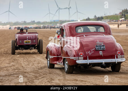 two drag racing cars line up ready to race at the track Stock Photo - Alamy