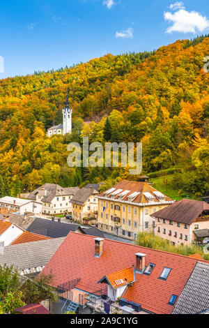 The village of Kropa, Slovenia with fall foliage color Stock Photo - Alamy