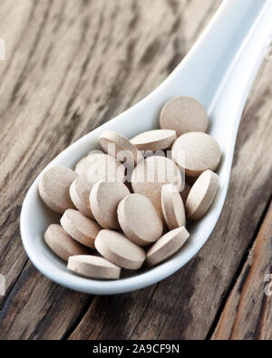 A close-up of brewer's yeast pills used in beer and bread production on ...