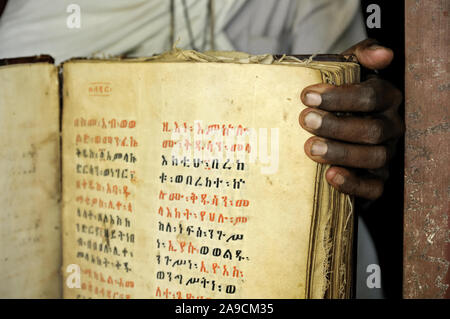 Close-up of an ancient sacred manuscript of 1500s by Benedictine monks ...