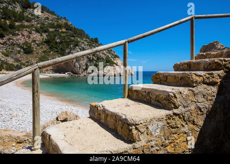 Stone Steps on the stunning La Granadella beach in Javea, Spain Stock ...