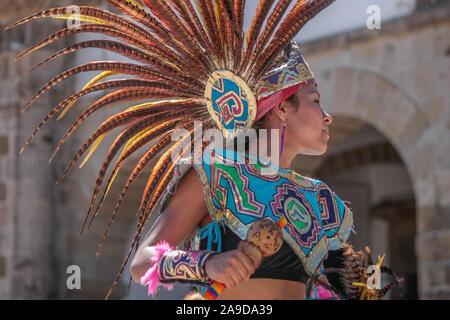 Mexican Concheros dance in a ceremony outside the Parroquia Church of ...
