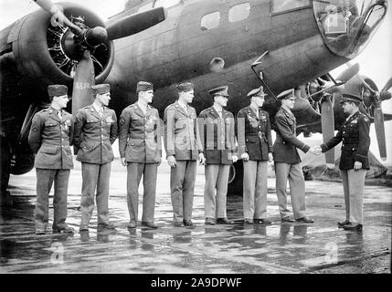 Colonel Curtis LeMay officially congratulates a bomber crew of the ...