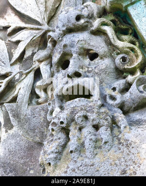 An image of an old grunge stone face Stock Photo - Alamy