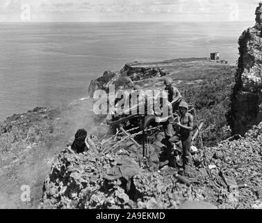 8 25 1944 marines manning a field howitzer blast a Japanese nest in a ...