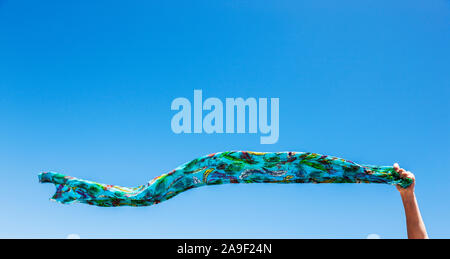 Fabric Rag Blowing In The Wind, White Background Stock Photo - Alamy