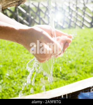 Fountain with dripping water Stock Photo - Alamy