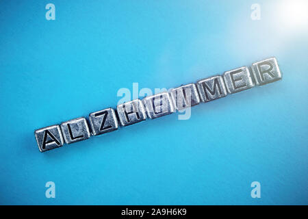 Alzheimer's disease background concept represented by cubic metal ...