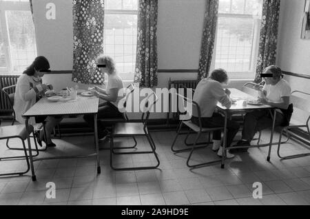 Inmates eat lunch Stock Photo - Alamy