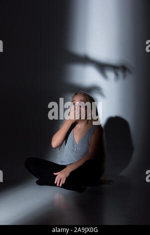Little Girl Crying With Shadow Of Parents Arguing - Home Violence And ...