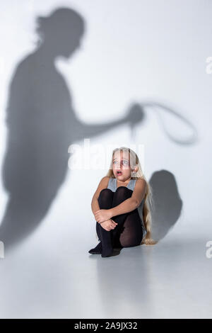 Little Girl Crying With Shadow Of Parents Arguing - Home Violence And ...