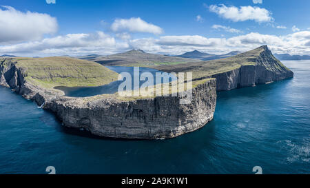 Bosdalafossur waterfall and Sorvagsvatn lake on Vagar island coastline ...