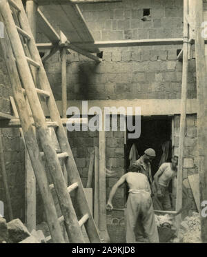 Construction work on a building site in Dubai Stock Photo - Alamy