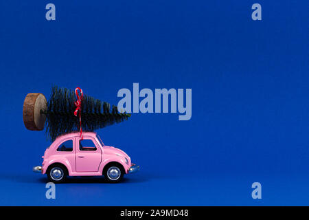 Vilnius, Lithuania - November 15, 2019: Yellow retro toy model car with ...