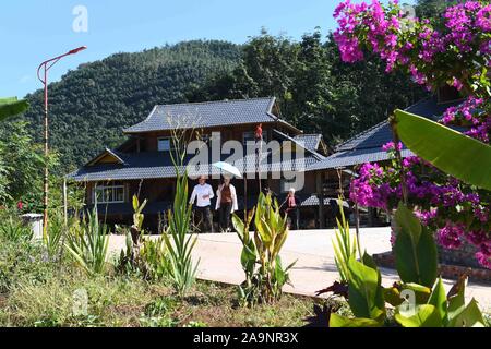 Mengla, China's Yunnan Province. 16th Nov, 2019. Children play outside ...