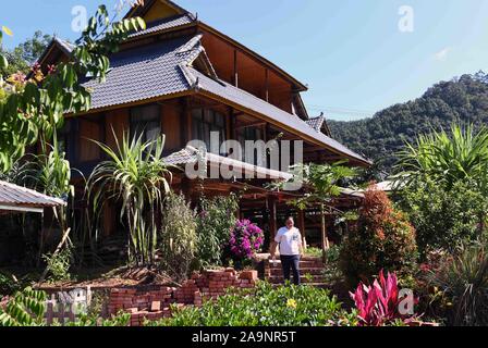 Mengla, China's Yunnan Province. 16th Nov, 2019. Children play outside ...