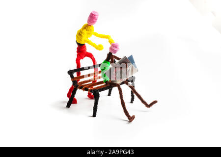 Pipe cleaner figures against a white background Stock Photo - Alamy