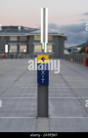 A blue parking sign on column Stock Photo - Alamy