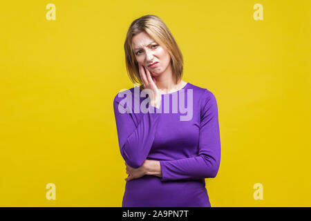 I'm bored. Portrait of tired disinterested man in denim casual shirt ...