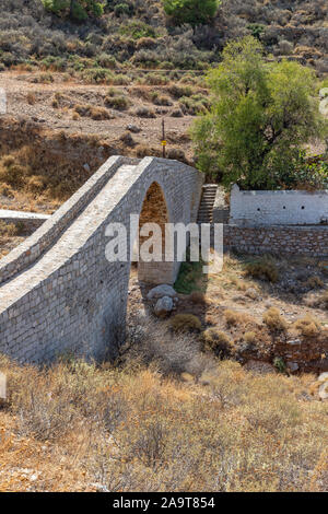 Stone bridge close to Vlychos Beach in Hydra Island, Greece Stock Photo ...