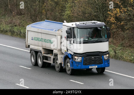 Heavy trucks with moving stone rock in a construction site on load ...